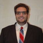 Justin J. Davis | Vecchione Law